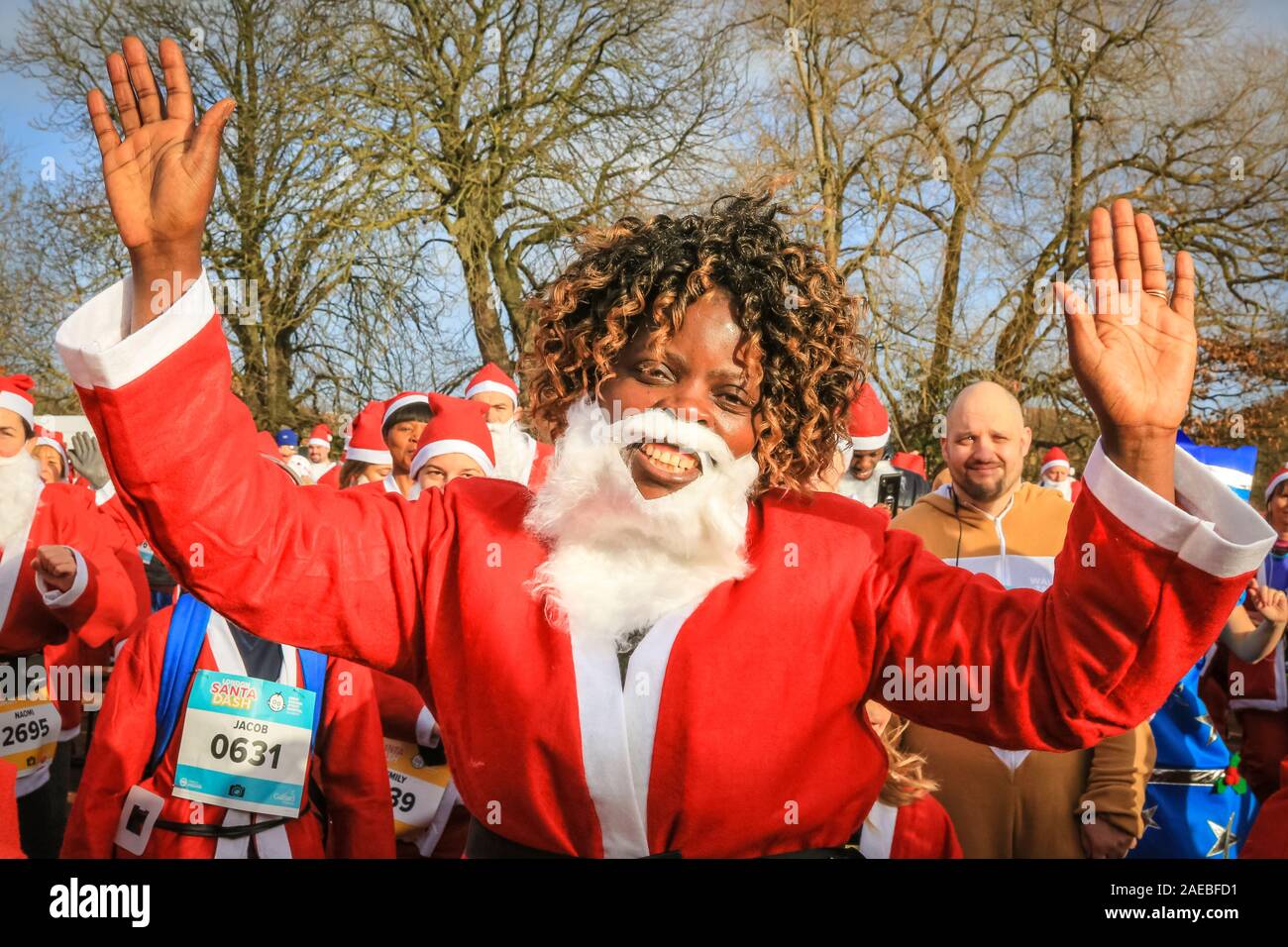 Brockwell Park, London, UK, 08th Dec 2019. The Santas have a warm up ...