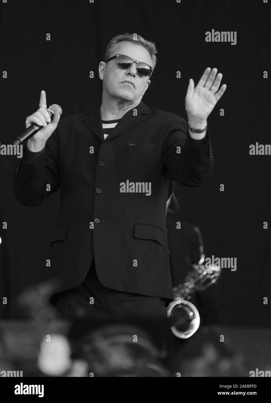 Madness lead singer Black and White Stock Photos & Images - Alamy