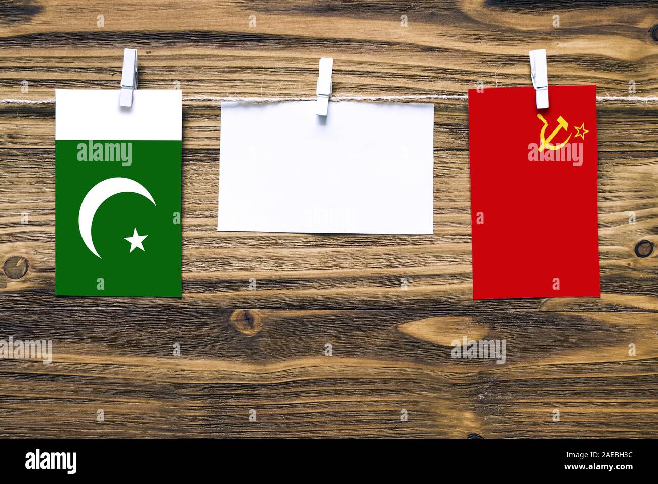 Hanging flags of Pakistan and Soviet Union attached to rope with ...