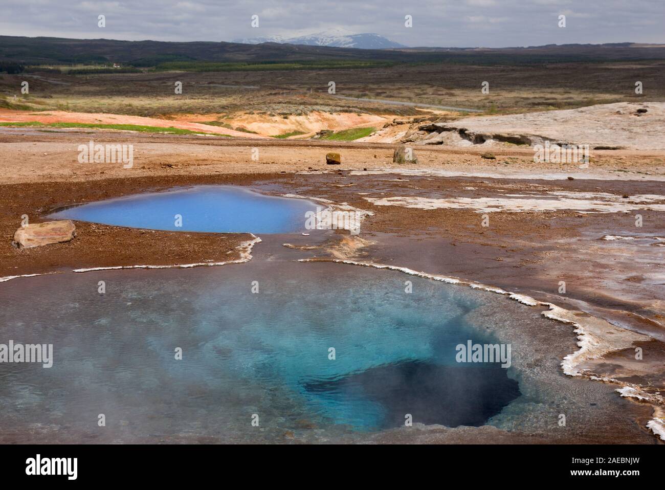 Beautiful blue hot springs in the Geysir area in Iceland Stock Photo ...
