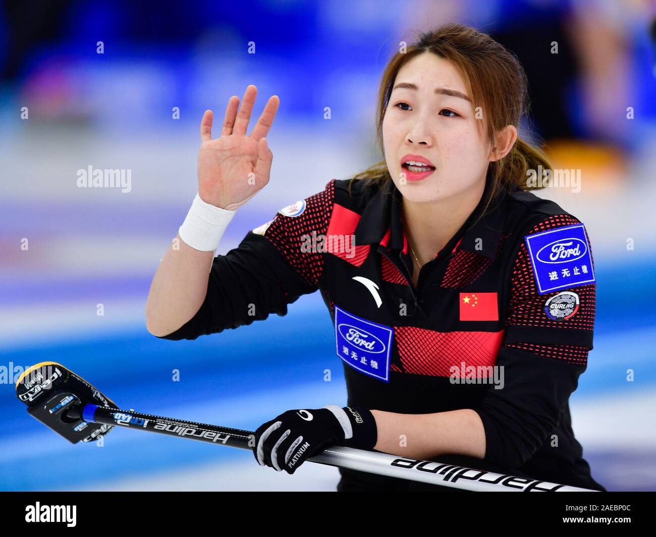 Xining, China. 8th Dec, 2019. Zhang Lijun of China reacts during the ...