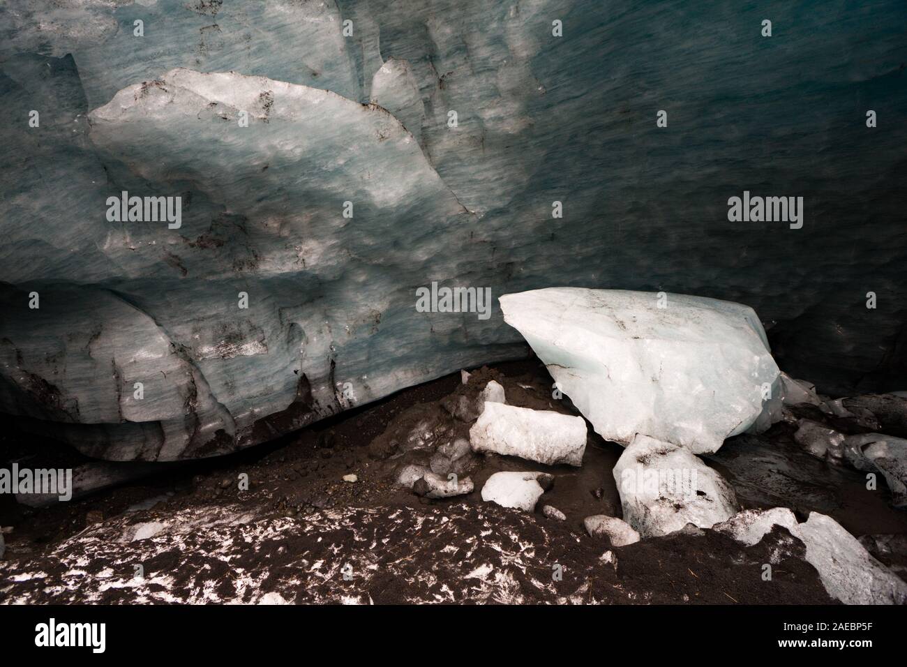 A cave with ice boulders inside an icelandic glacier, Iceland Stock ...
