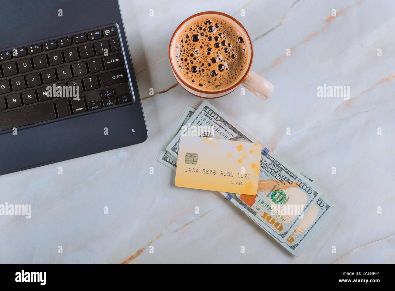 Money computer keyboard bills hi-res stock photography and images - Alamy