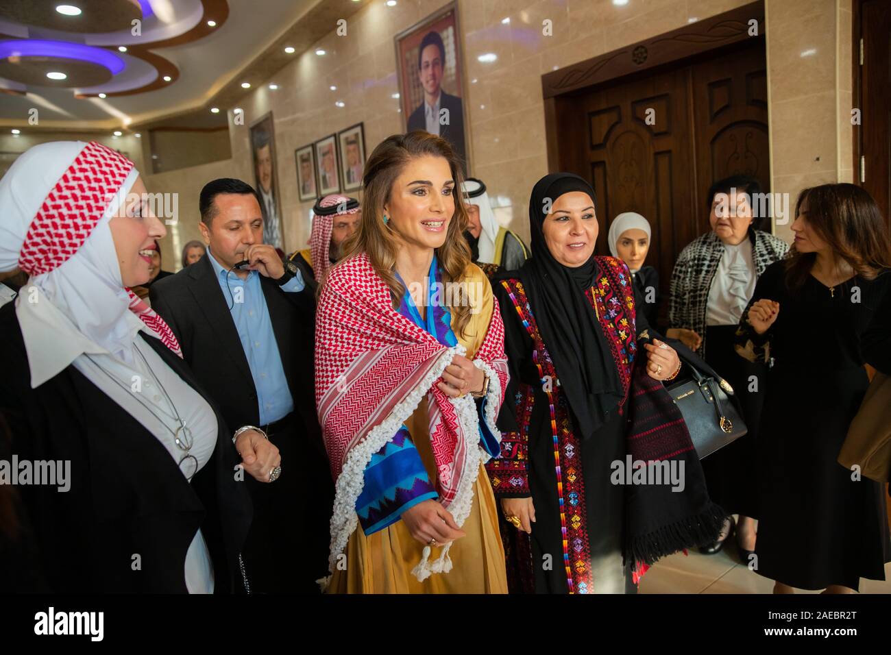 Queen Rania with members of the Al Da’aja tribe in Amman, on December ...