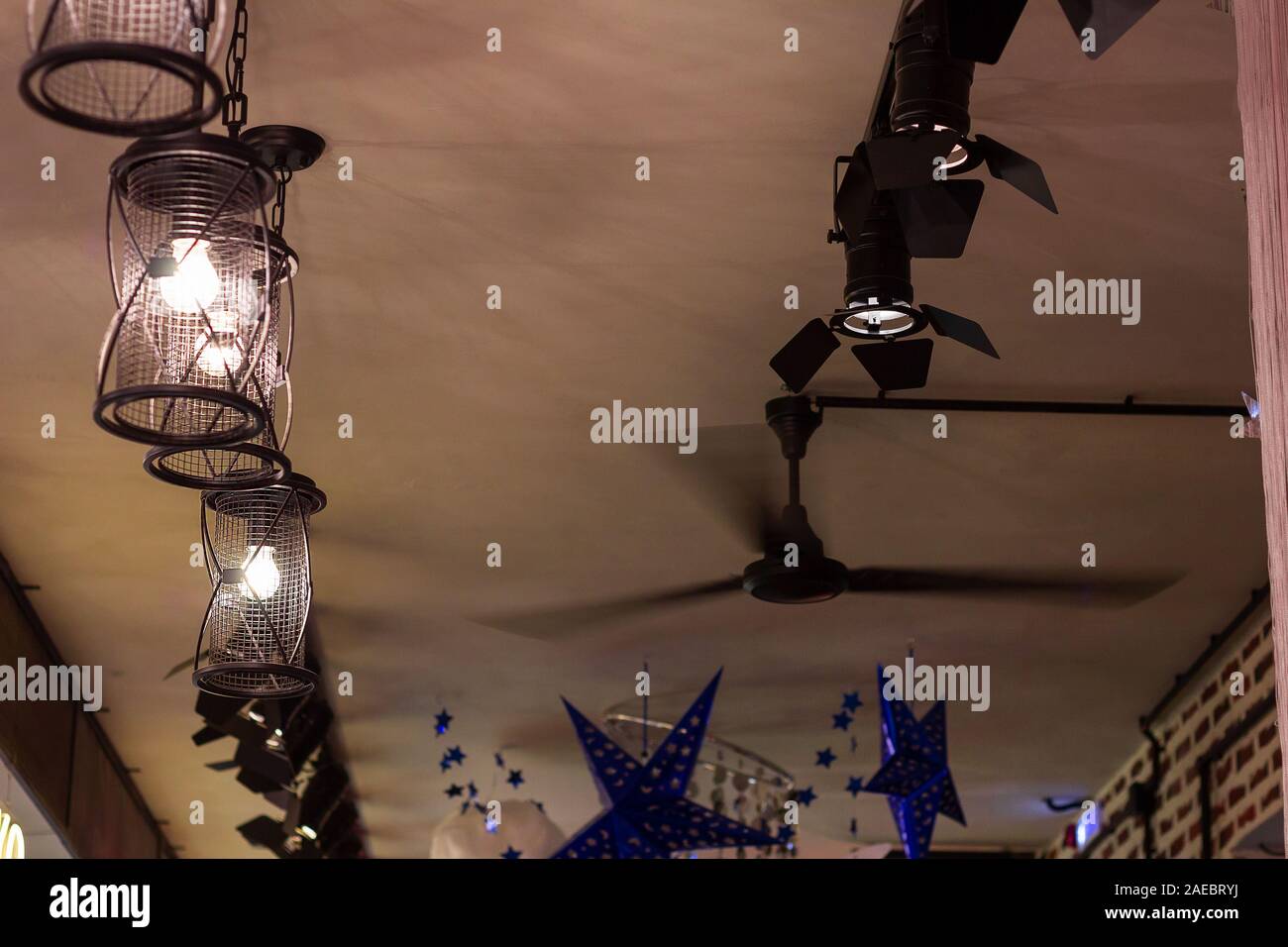 ceiling fan lamps and spotlight. the interior of the cafe Stock Photo ...