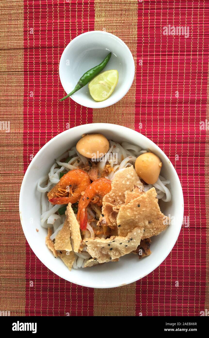 Vietnamese rice noodle cuisine (Mi Quang) at local restaurant in Hoi An ...