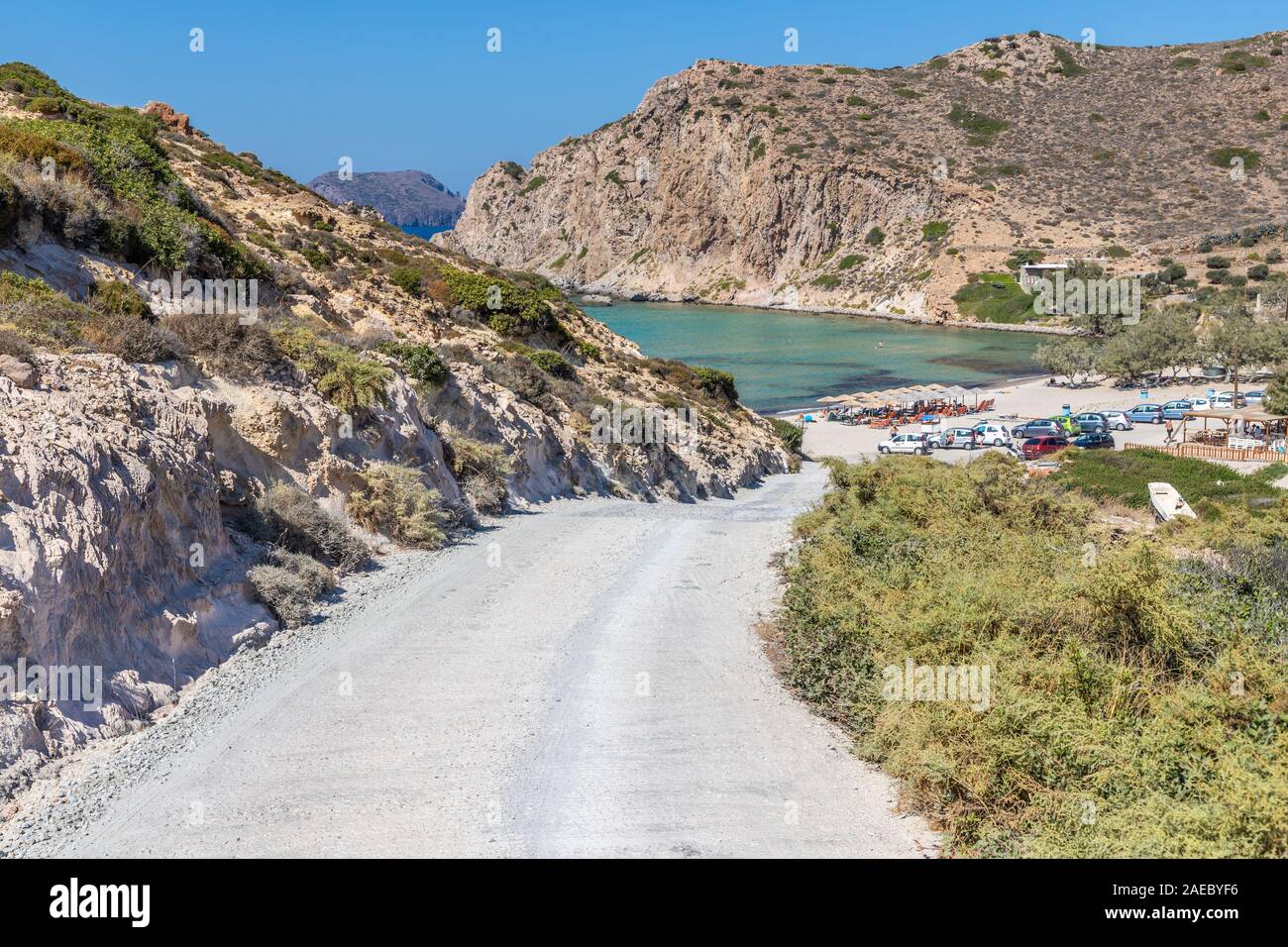 Plathiena beach with cliffs and vegetation, Milos, Greece Stock Photo ...