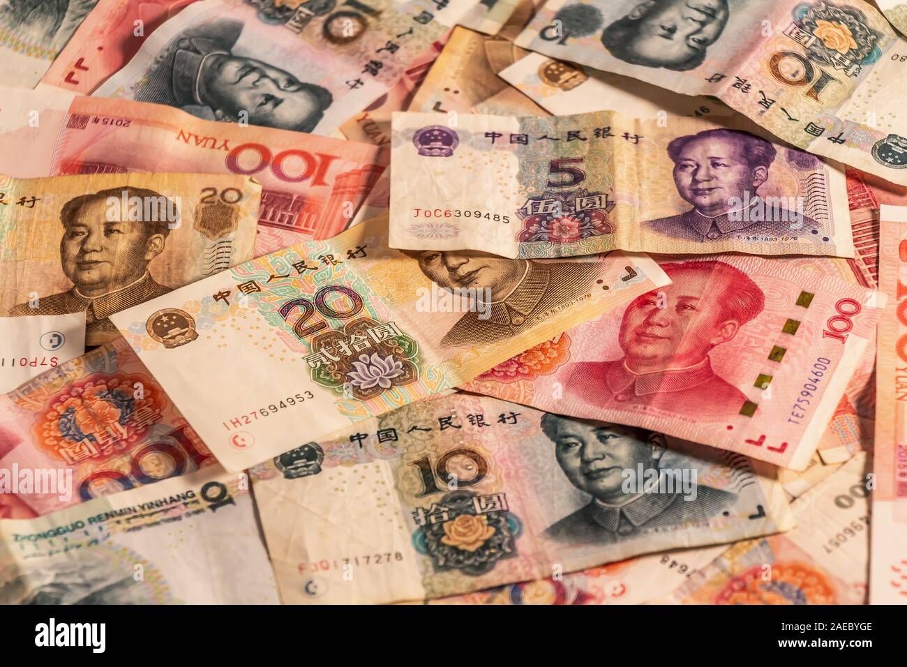 A composition of Chinese Renminbi RMB. People's Currency. Yuan CNY ...
