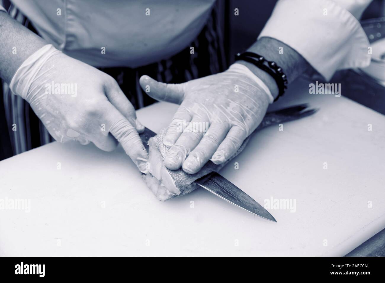 Chef filleting fish hi-res stock photography and images - Alamy