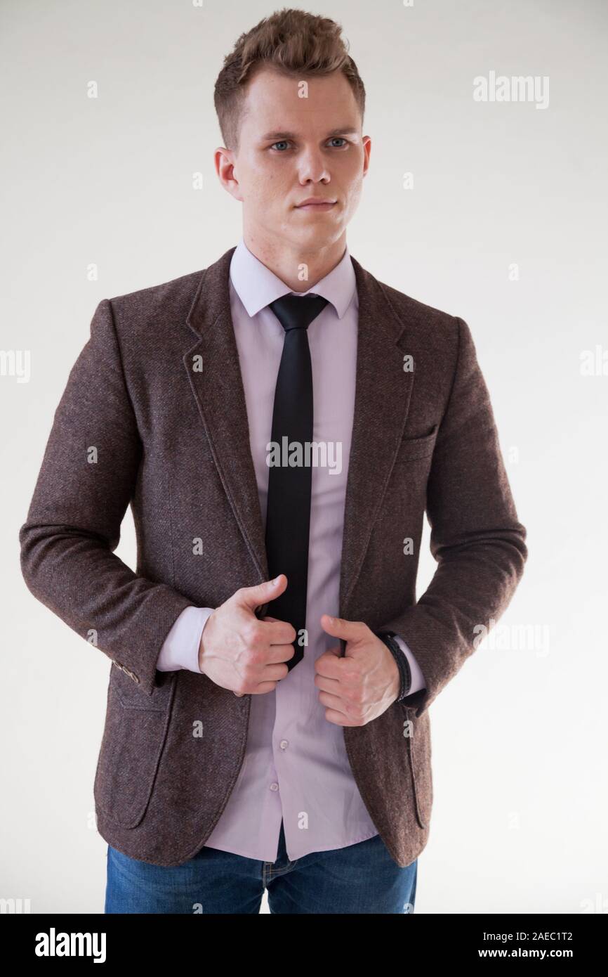 Portrait of a fashion business man at work in the office Stock Photo ...