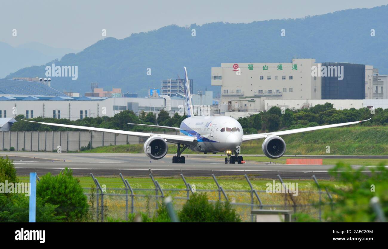 Osaka, Japan - Jun 26, 2019. ANA passenger airplane taxiing on runway ...