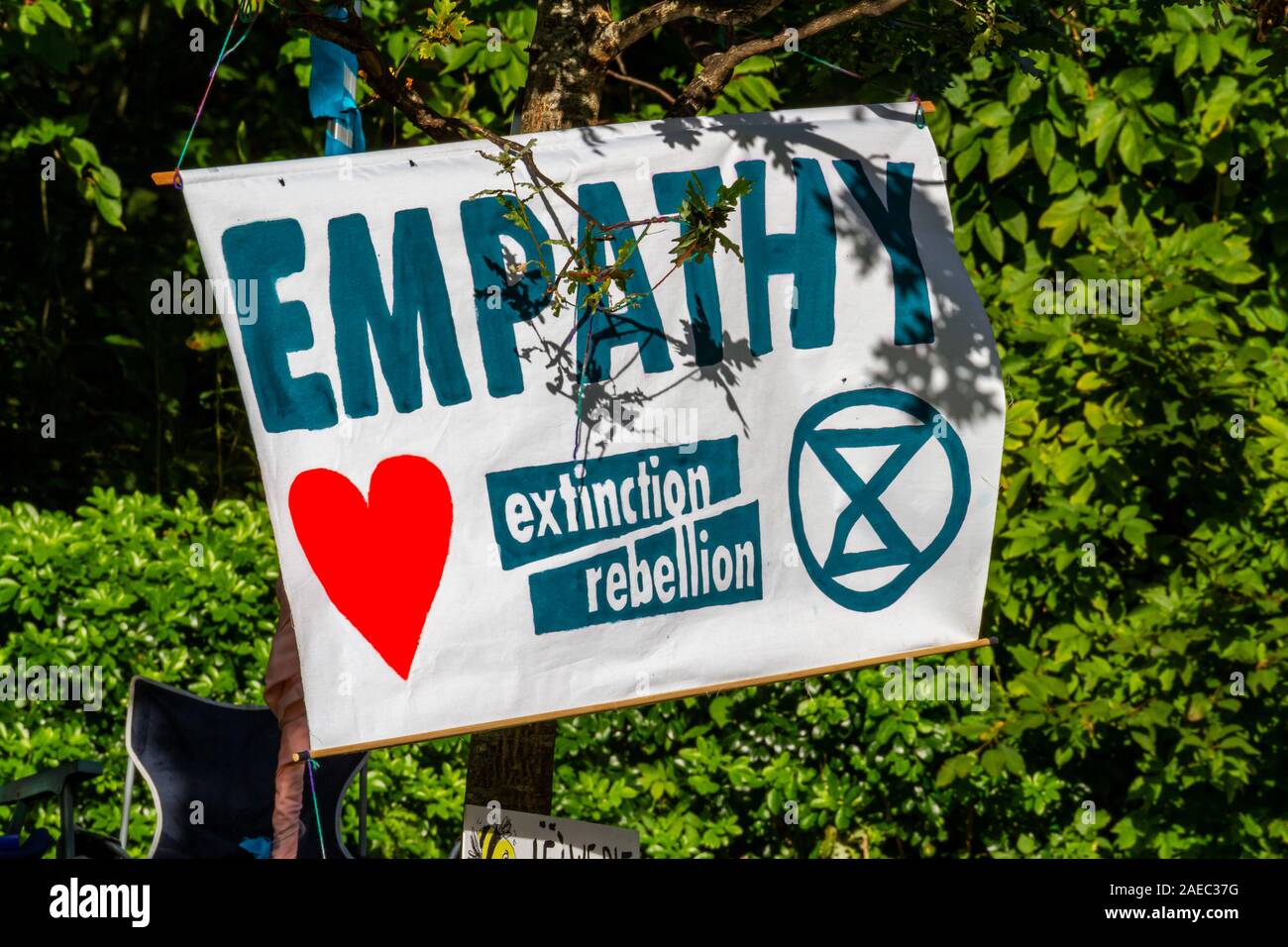 Extinction Rebellion sign poster with love heart. Peaceful protest ...