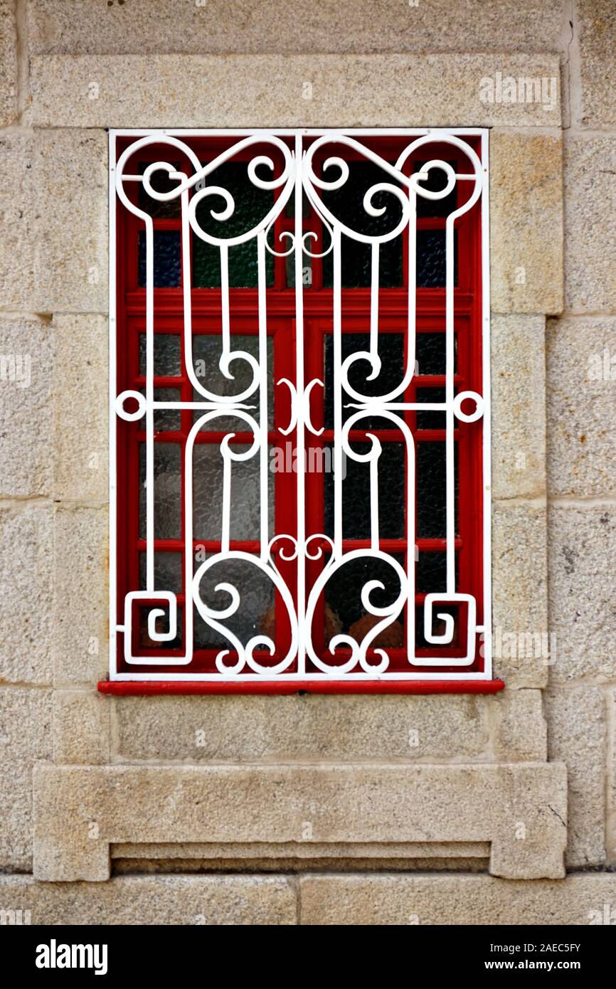 Image of wall with red window with white styled iron grid Stock Photo ...