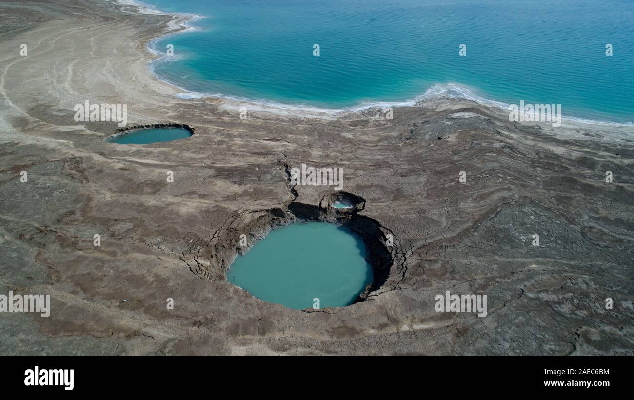Aerial Photography with a drone. Elevated view of sink holes on the ...