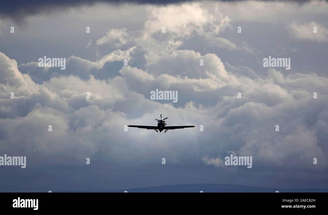 A large single engine private aircraft taking off from a small regional ...