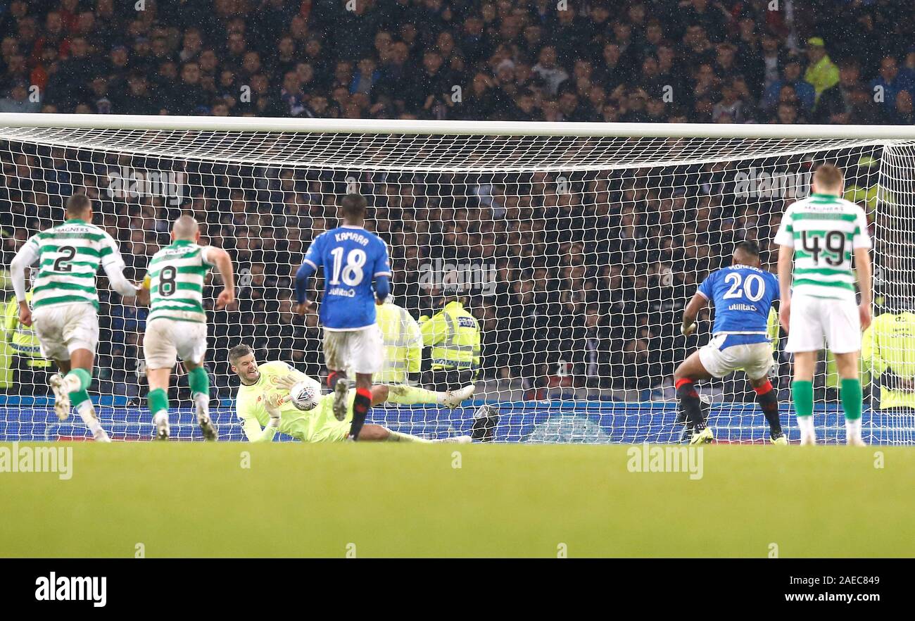 Celtic goalkeeper Fraser Forster (centre) saves the penalty from ...
