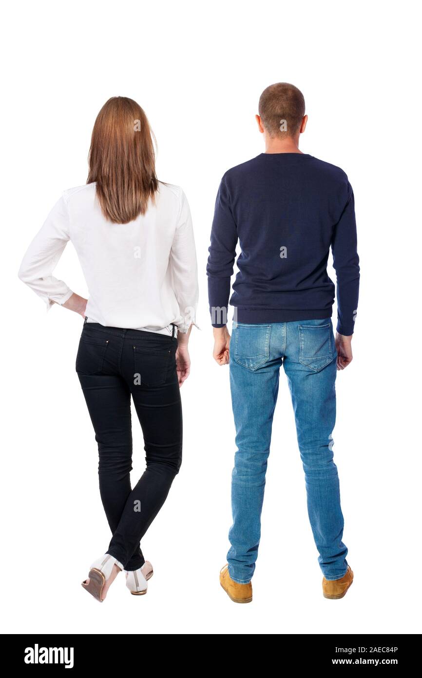 Back view of couple. beautiful friendly girl and guy together. Rear ...