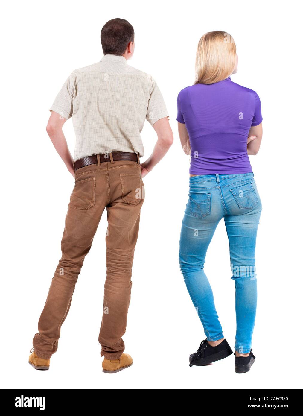 Back view of couple. beautiful friendly girl and guy together. Rear ...