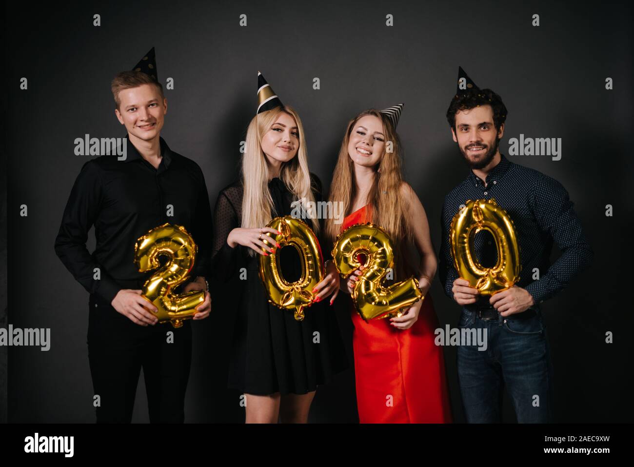 Group of beautiful people are celebrating 2020 new year Stock Photo - Alamy