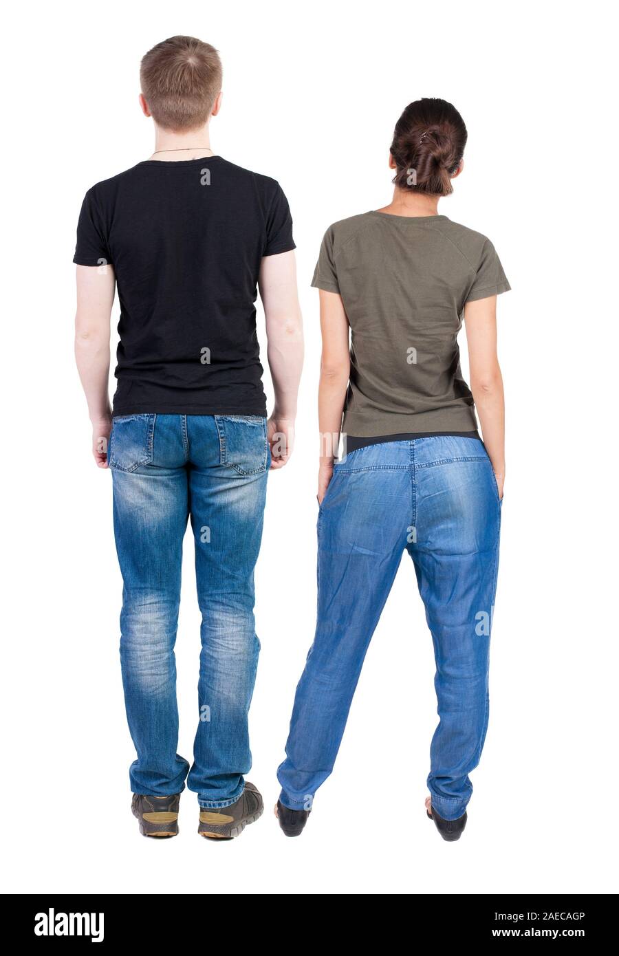 Back view of couple. beautiful friendly girl and guy together. Rear ...
