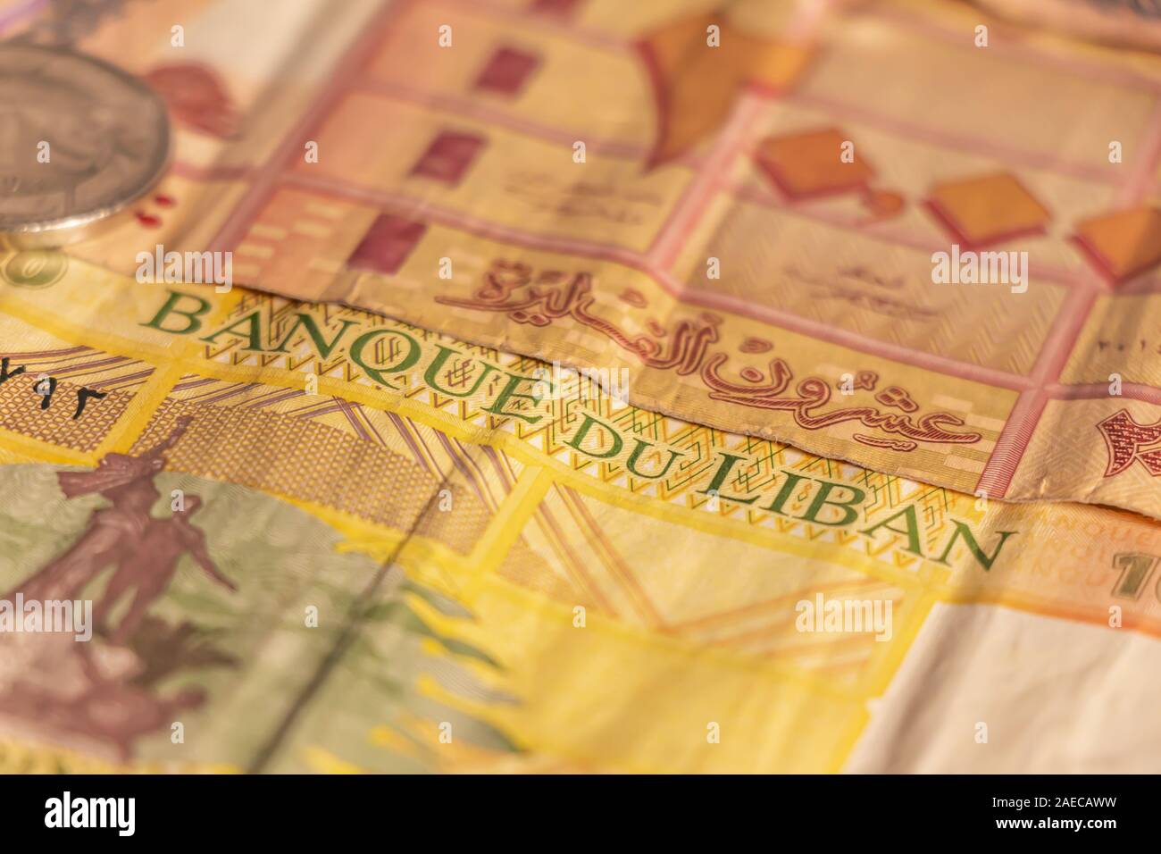 A composition of Lebanese lira LL. Lebanese pound LBP banknotes and ...