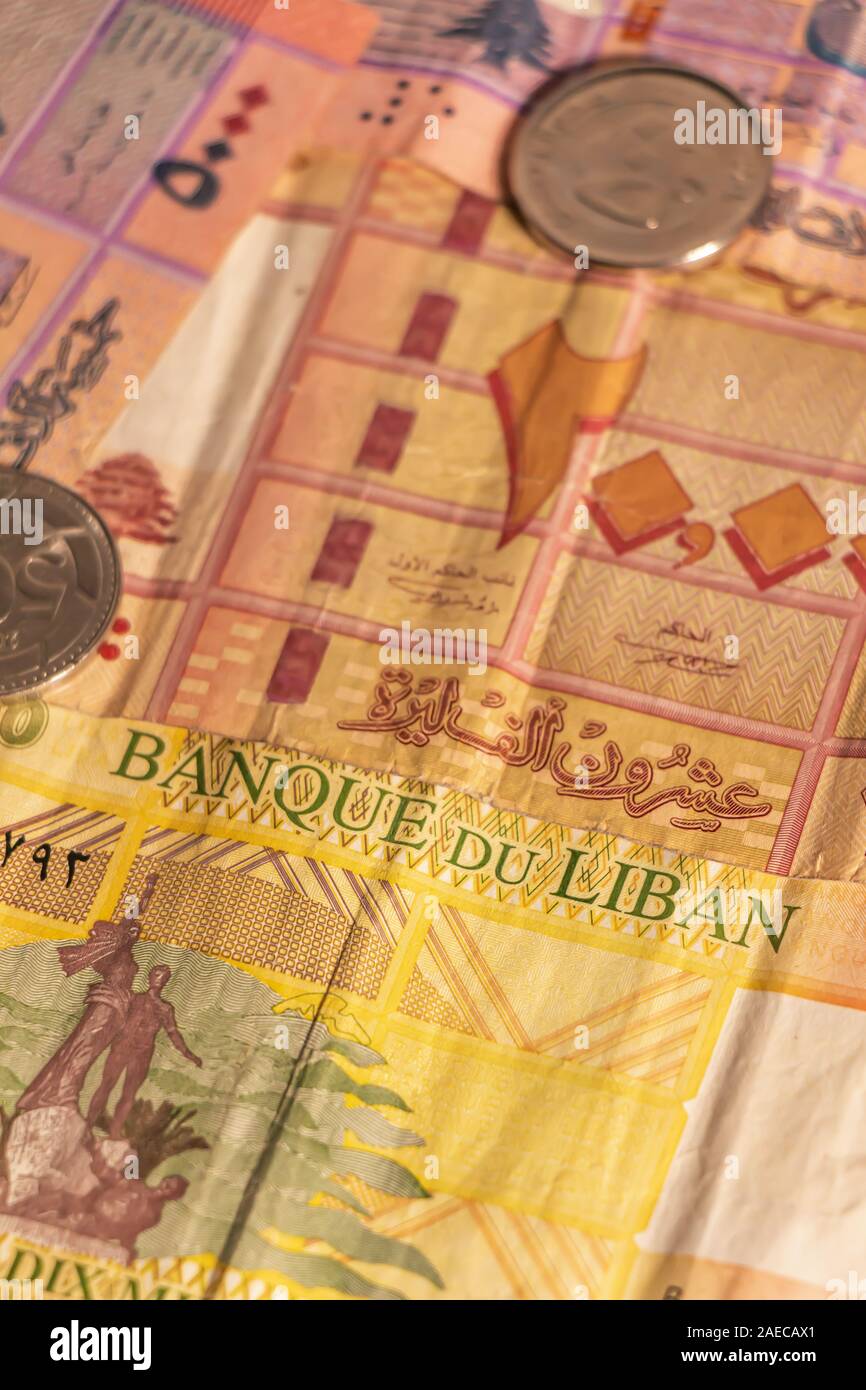 A composition of Lebanese lira LL. Lebanese pound LBP banknotes and ...