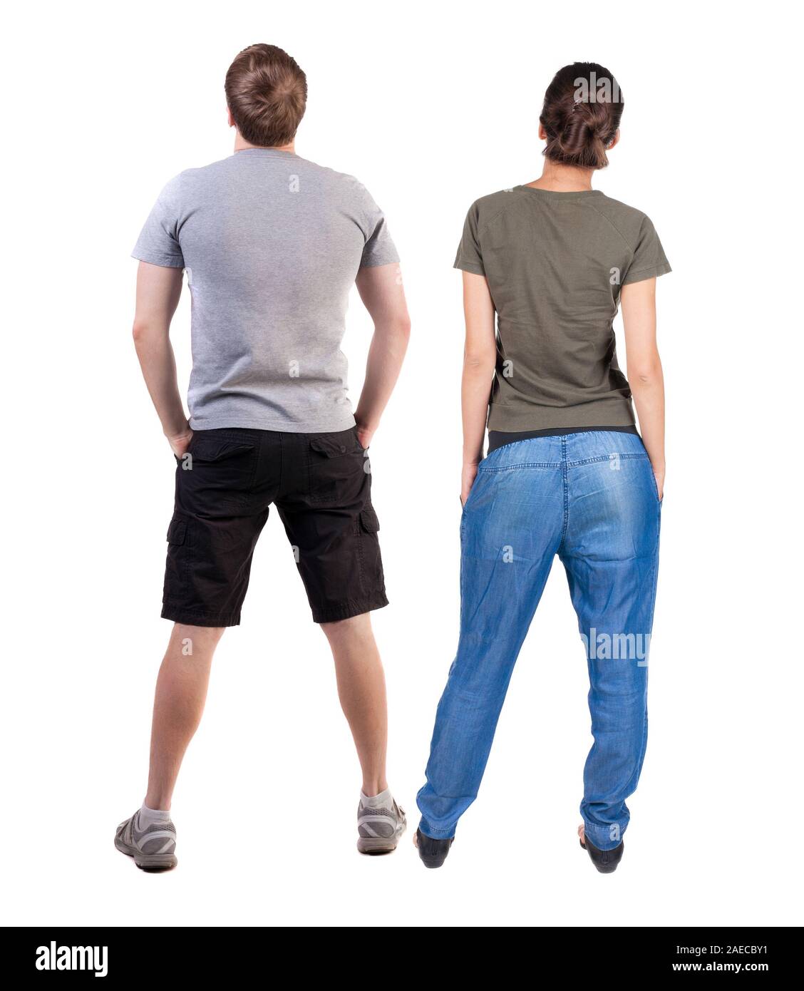 Back view of couple. beautiful friendly girl and guy together. Rear ...