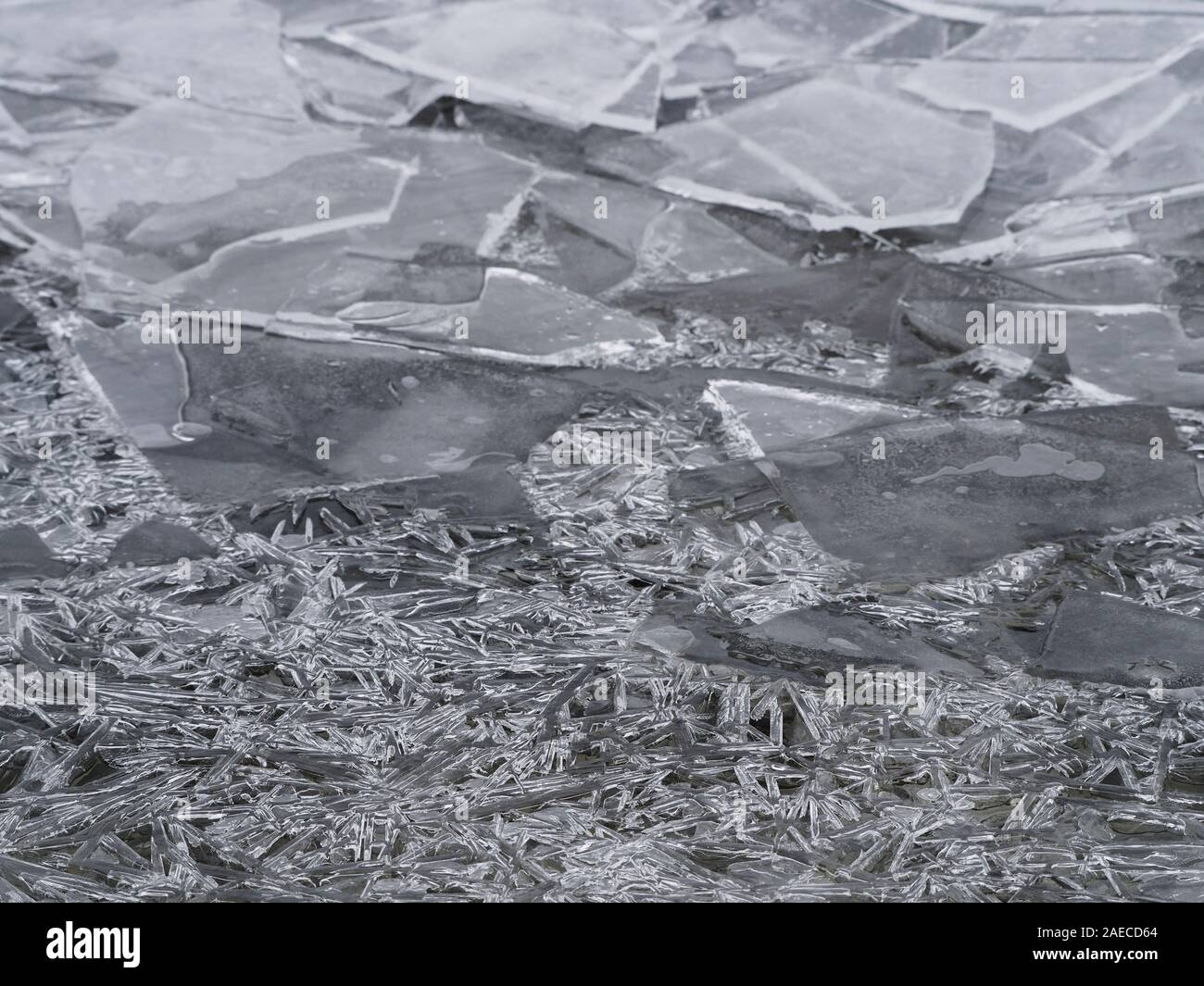 Clear ice washed up on the river shore like shards of glass Stock Photo ...