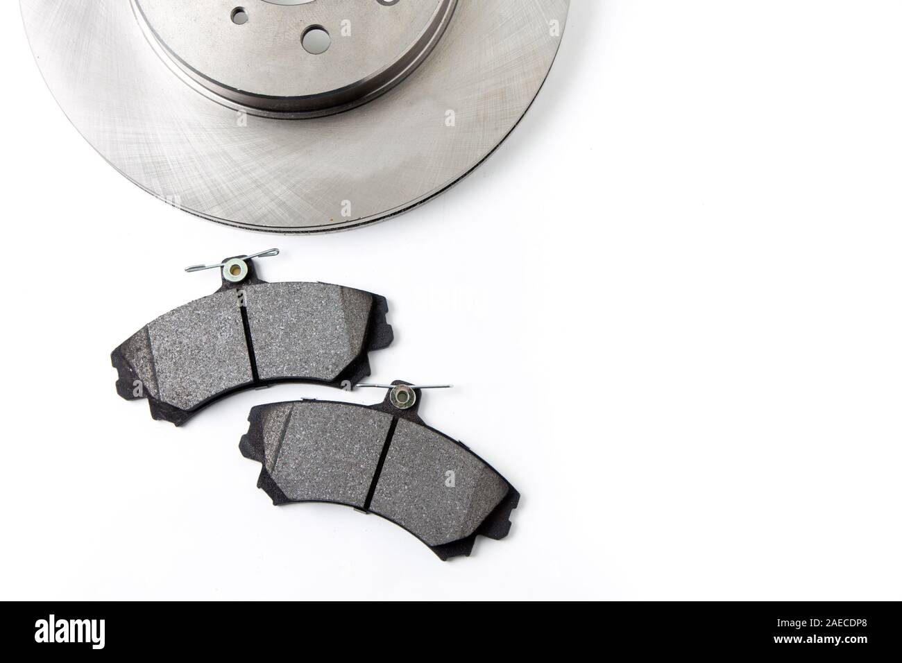 Brake pads and brake discs for cars isolated on white background. New ...