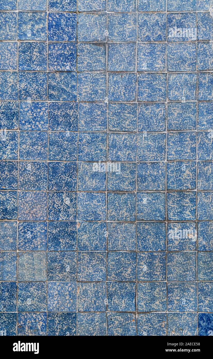 Close-up of wall of blue and aged ceramic tiles. High resolution full ...