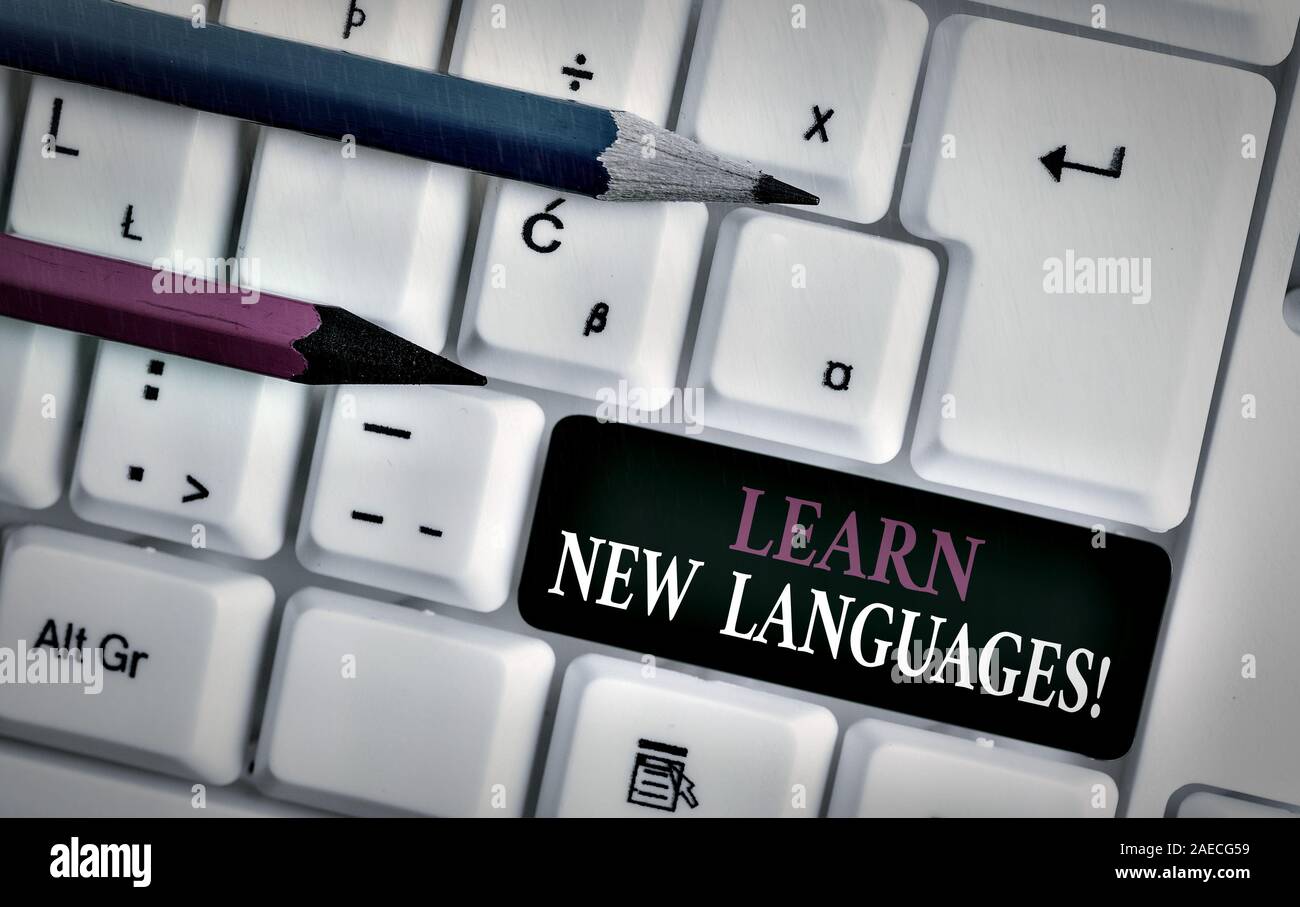 Text sign showing Learn New Languages. Business photo showcasing developing ability to ...