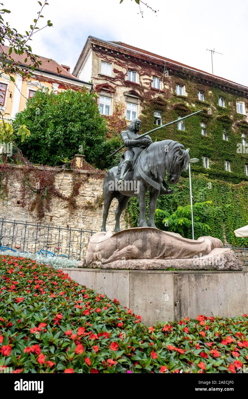 Saint George killing the Dragon statue Stock Photo - Alamy