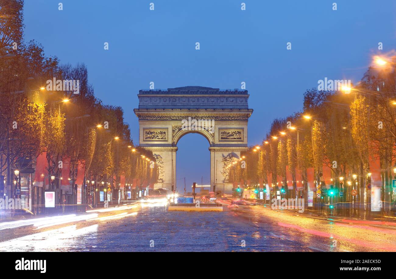 The famous Triumphal arch and Champs Elysees avenue,Paris Stock Photo ...