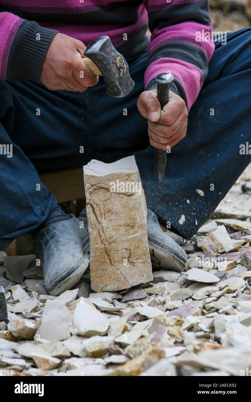 Hammer breaking rock hi-res stock photography and images - Alamy