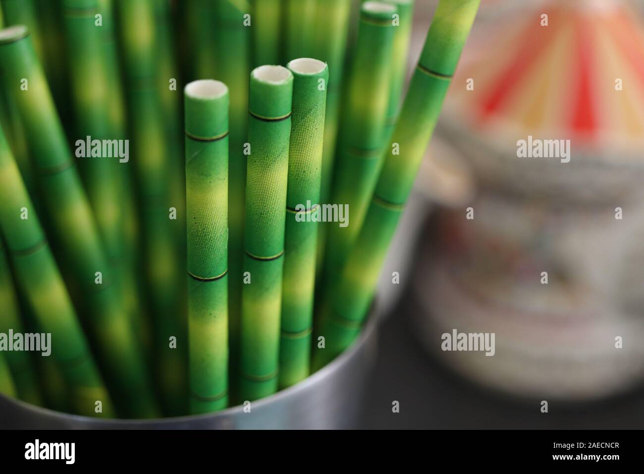 Paper straws painted to look like bamboo straws Stock Photo - Alamy