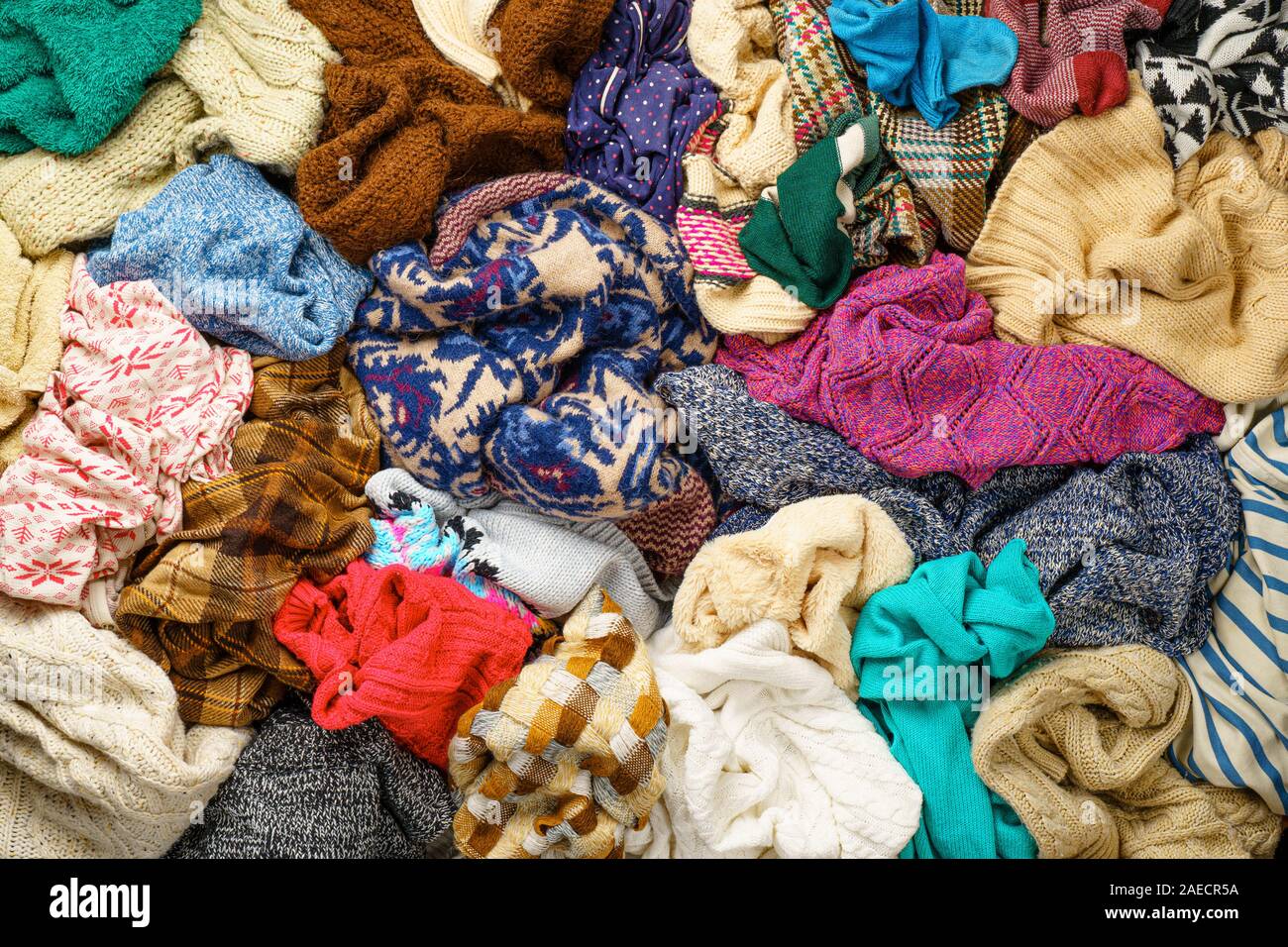 A Bunch of Different Clothes. Recyclable Textile Background. Sorting at ...