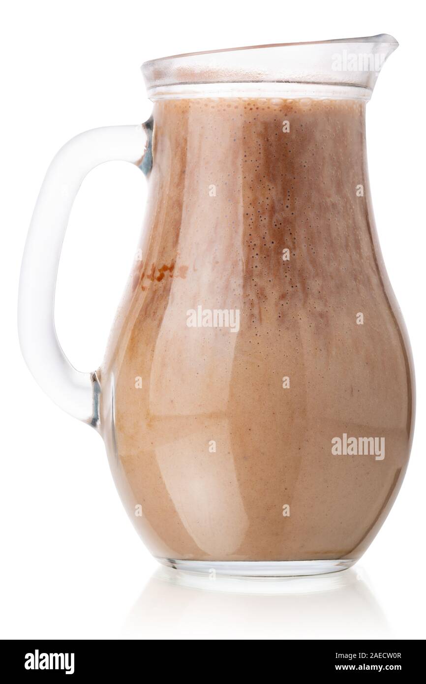 Pitcher of banana chocolate milkshake or smoothie isolated Stock Photo ...