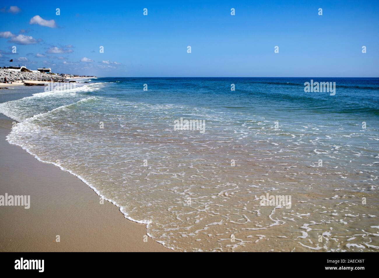 water small waves flowing over sand on the beach marineland florida usa ...