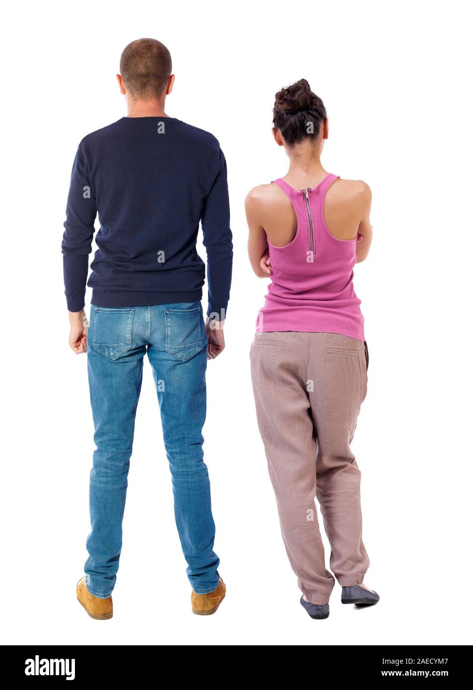 Back view of couple. beautiful friendly girl and guy together. Rear ...