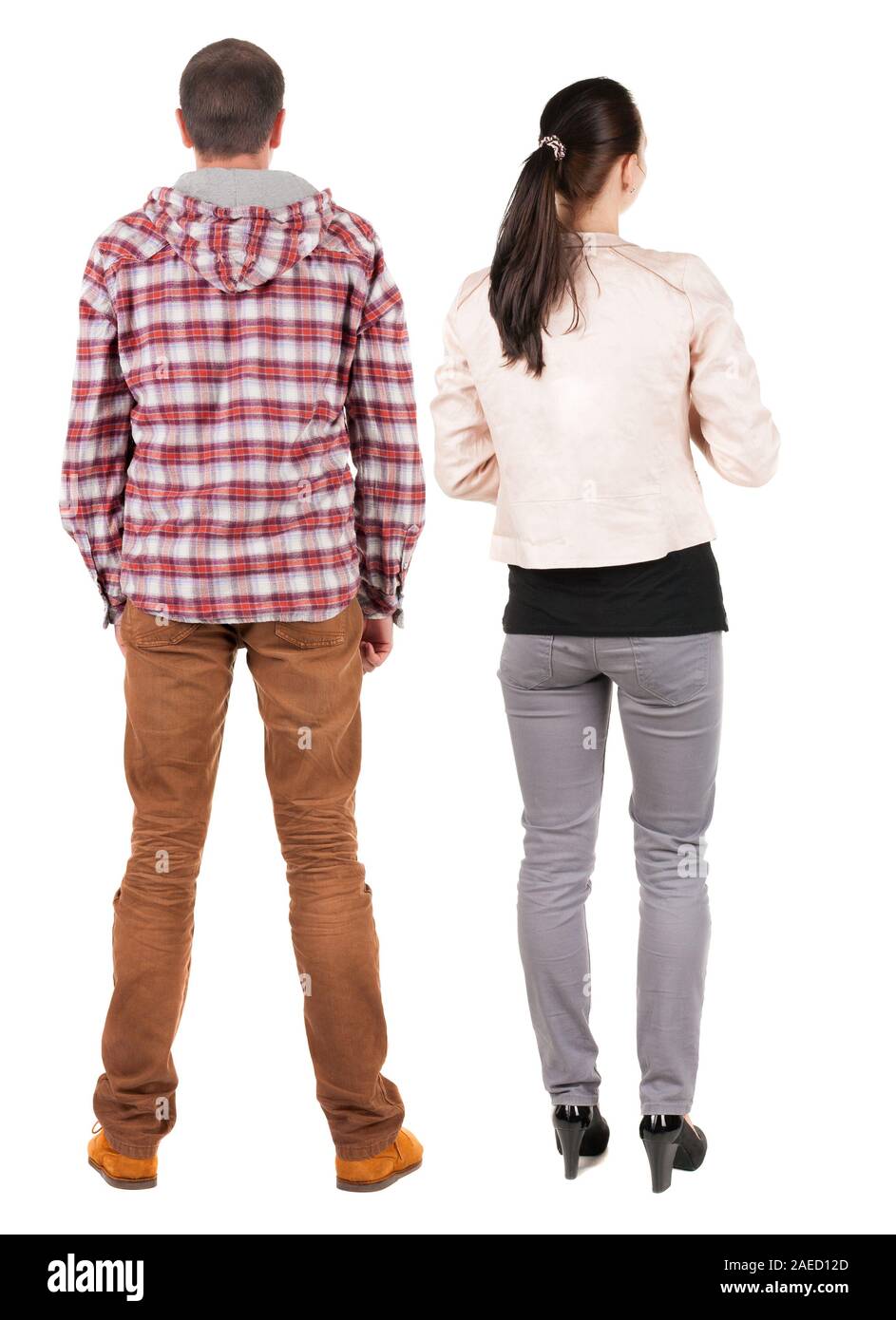 Back view of couple. beautiful friendly girl and guy together. Rear ...