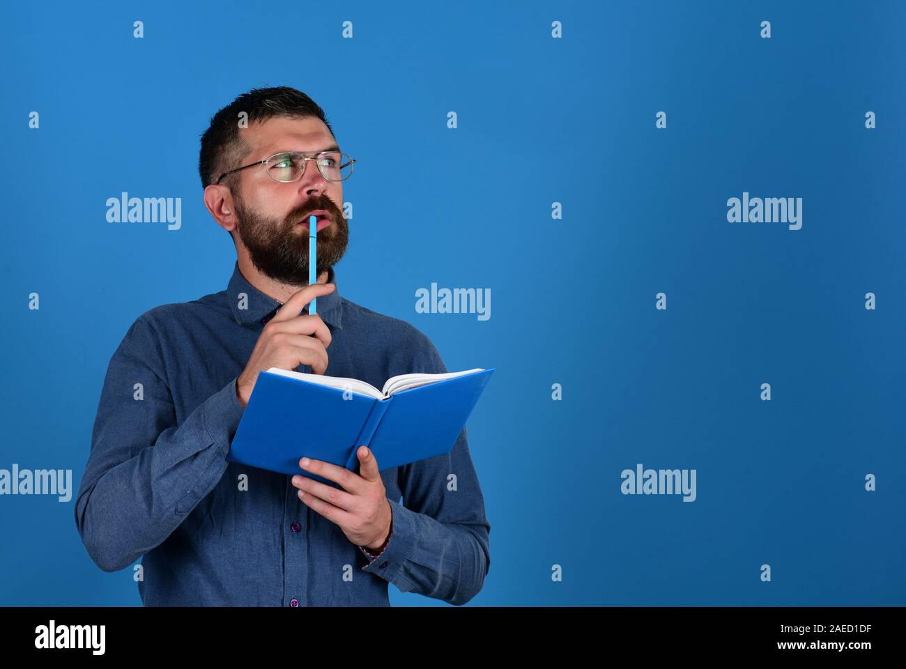 Man with beard and book. Idea and knowledge concept. Professor with ...