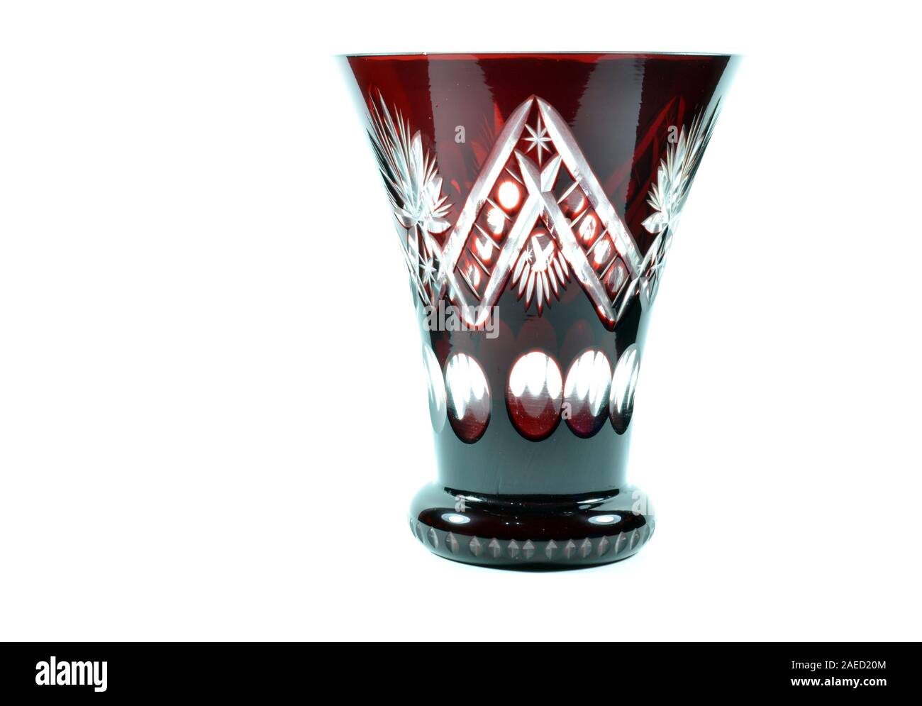 Vintage red crystal glass on white background Stock Photo - Alamy