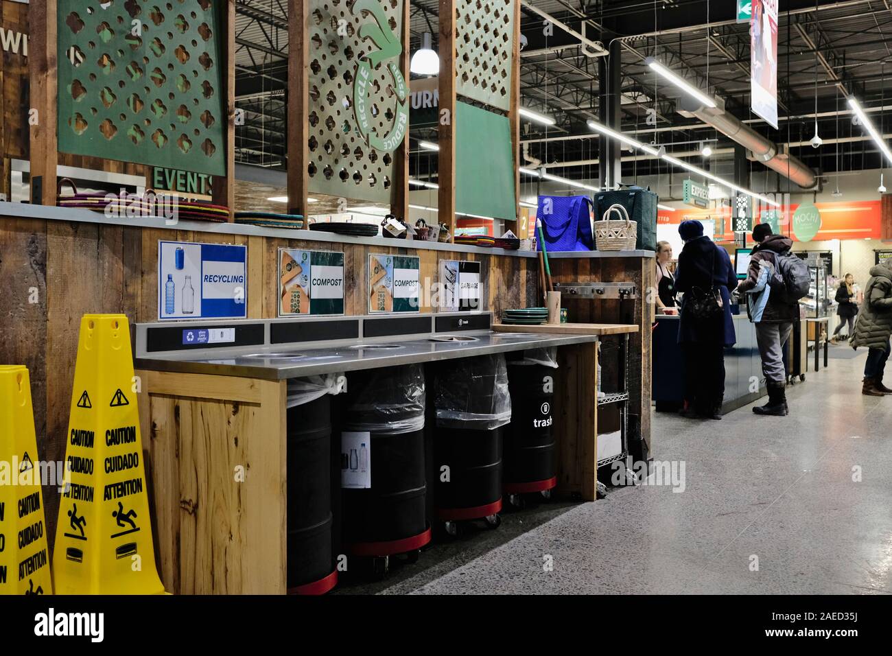 Recycling station and waste bins and checkout counters at the food ...