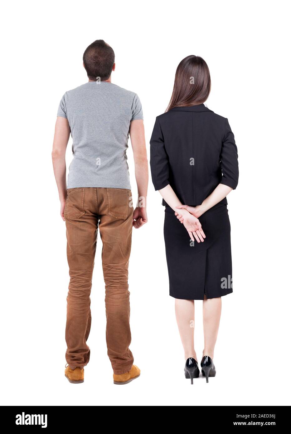 Back view of couple. beautiful friendly girl and guy together. Rear ...