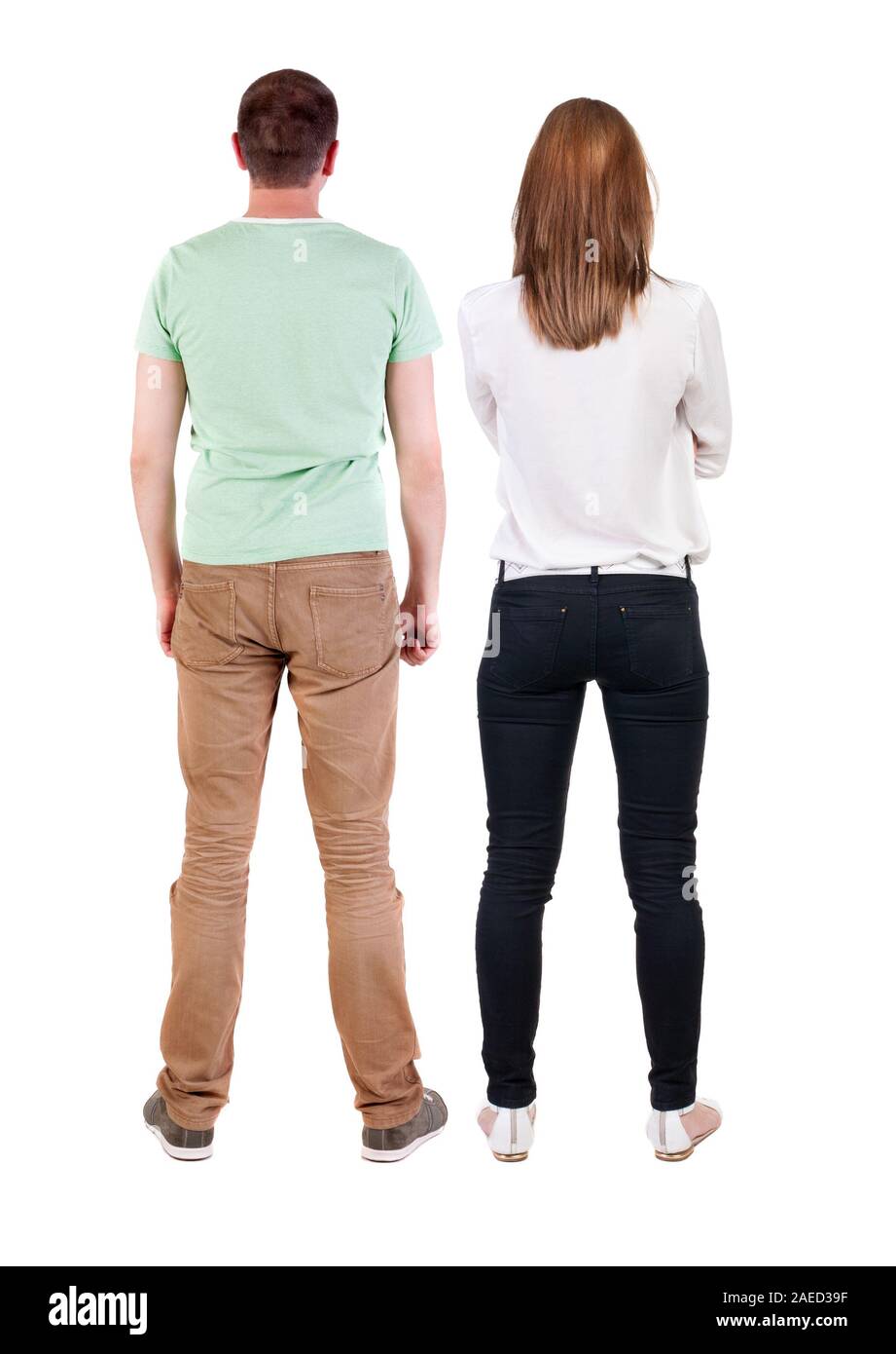 Back view of couple. beautiful friendly girl and guy together. Rear ...