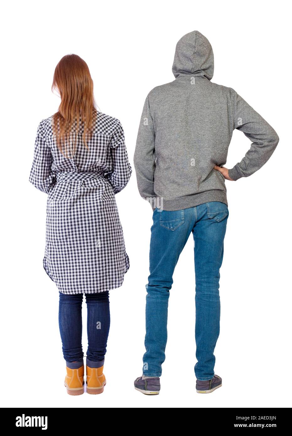 Back view of couple. beautiful friendly girl and guy together. Rear ...