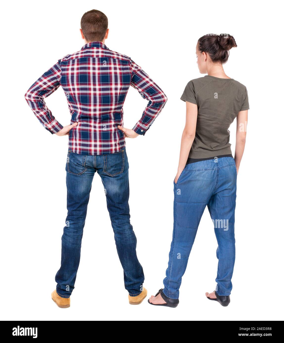 Back view of couple. beautiful friendly girl and guy together. Rear ...