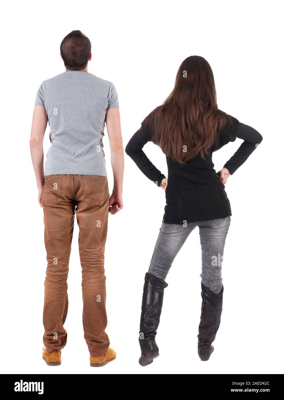 Back view of couple. beautiful friendly girl and guy together. Rear ...