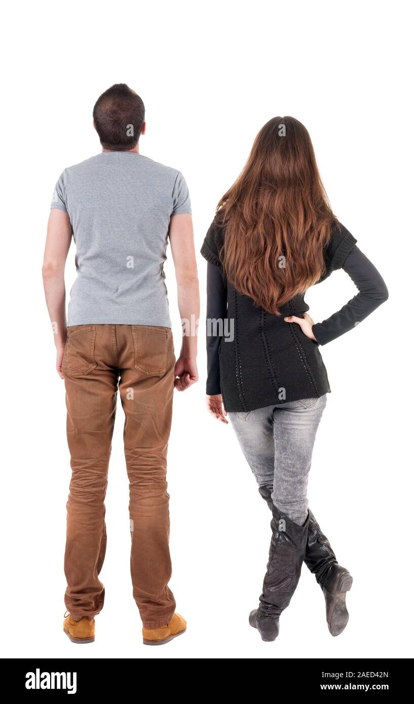 Back view of couple. beautiful friendly girl and guy together. Rear ...