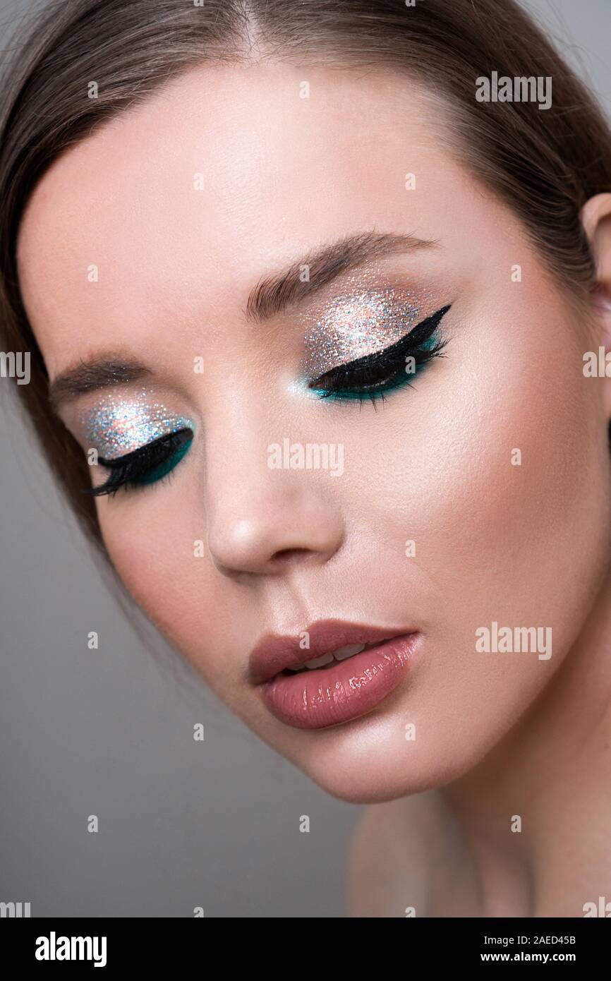 Close up of fashion model young woman in trendy make-up. Eye models ...